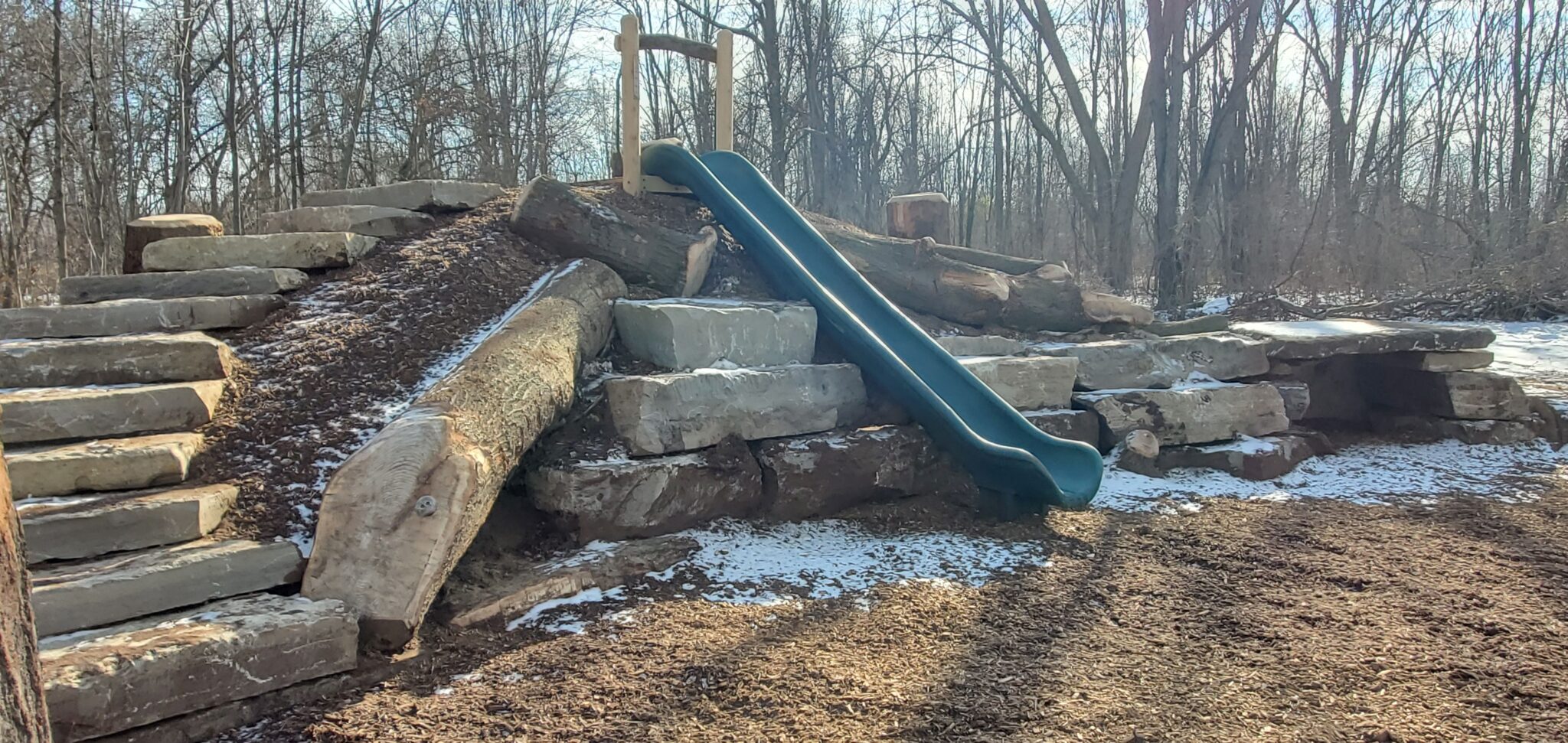 Embankment Slide with Stairs & Hobbit Cave | Nature Playscapes
